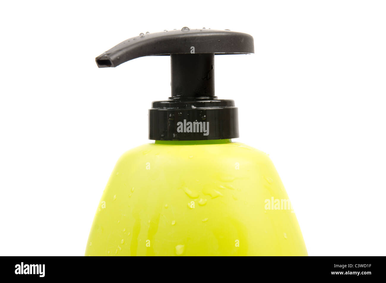 Close up of green shampoo bottle cap. Isolated on white background ...