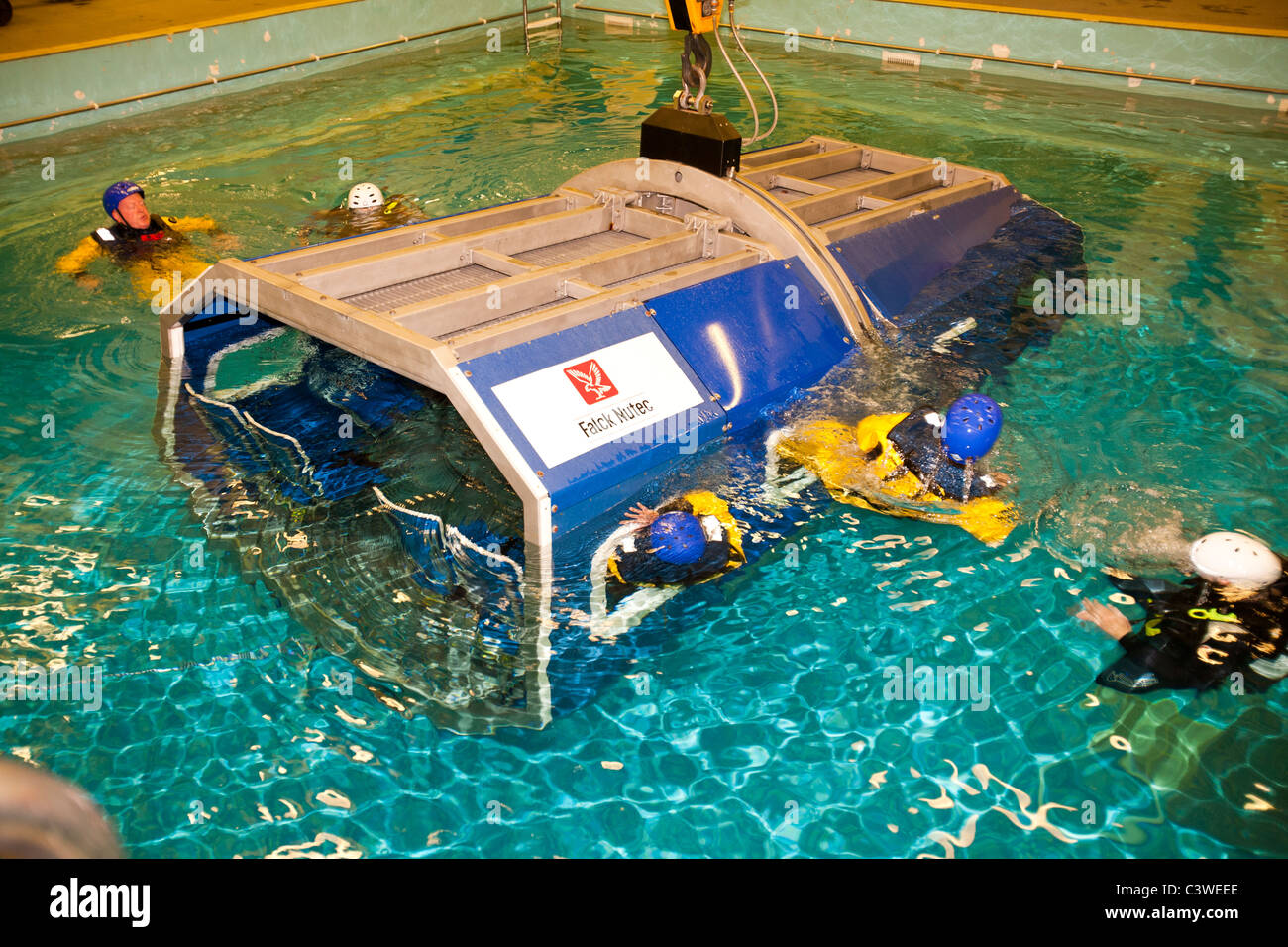 Workers in the offshore industry practice helicopter ditching ...