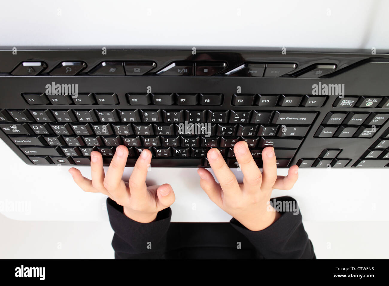 Office lady uses keyboard Stock Photo - Alamy