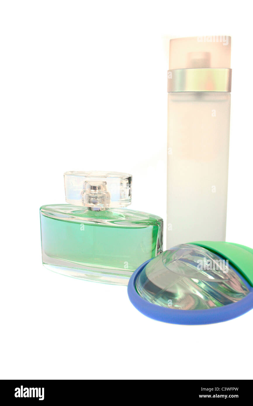 Three perfume bottles isolated on white background Stock Photo - Alamy