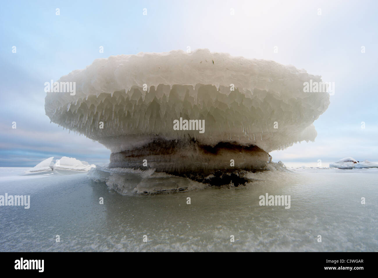 Ice cap on a stone Stock Photo - Alamy