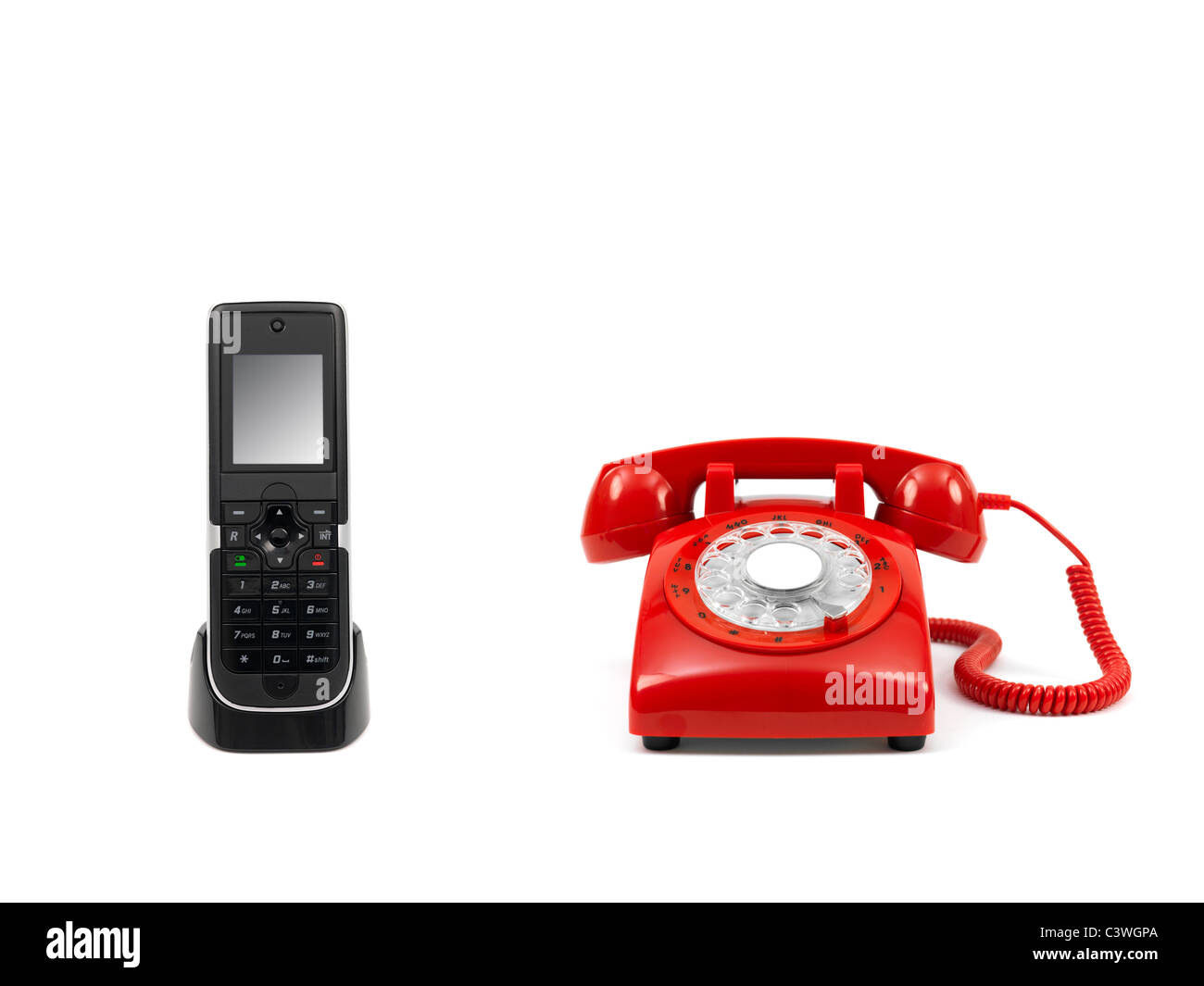 Telephones isolated against a white background Stock Photo - Alamy