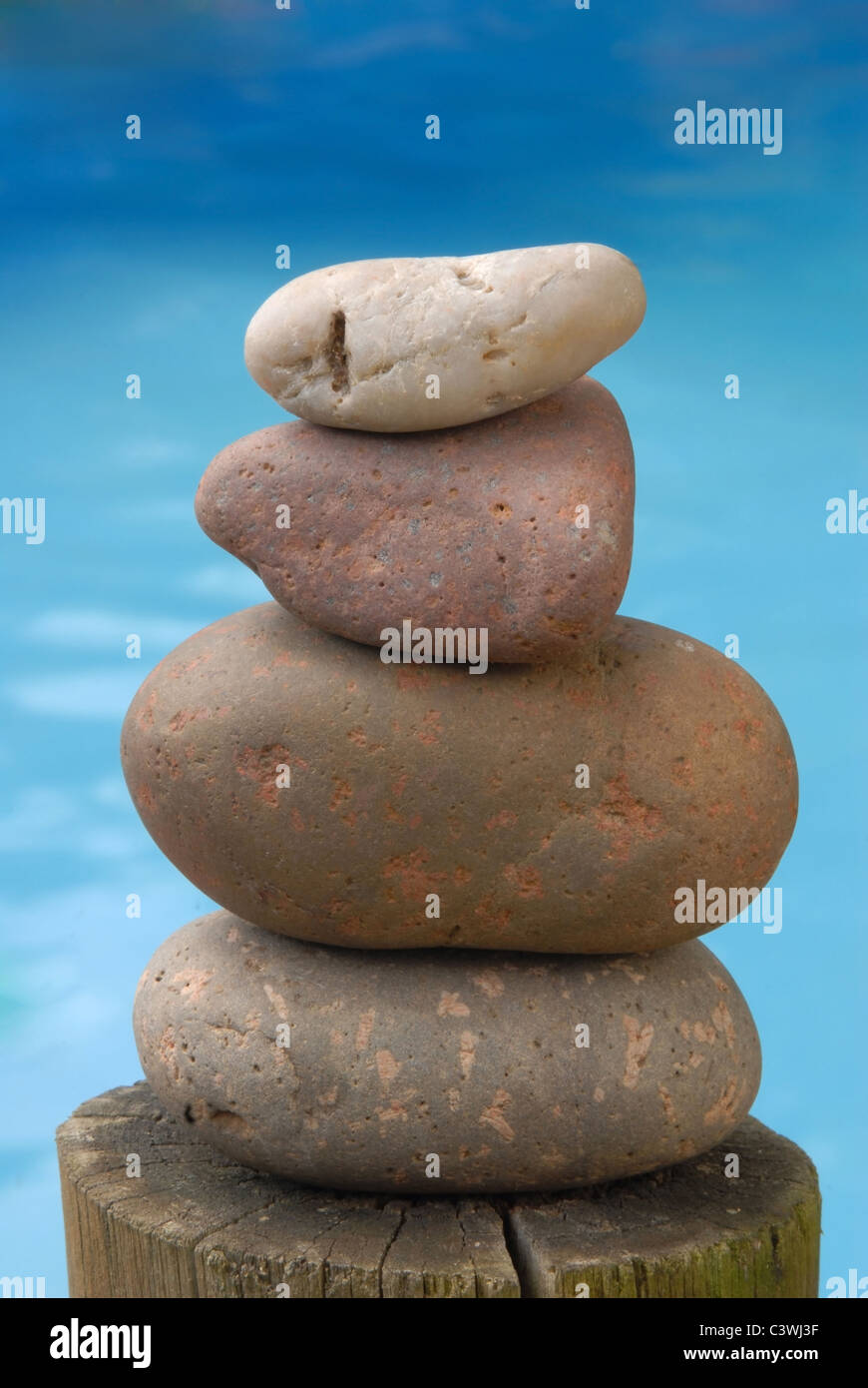 A balance group of zen stones with water background Stock Photo - Alamy