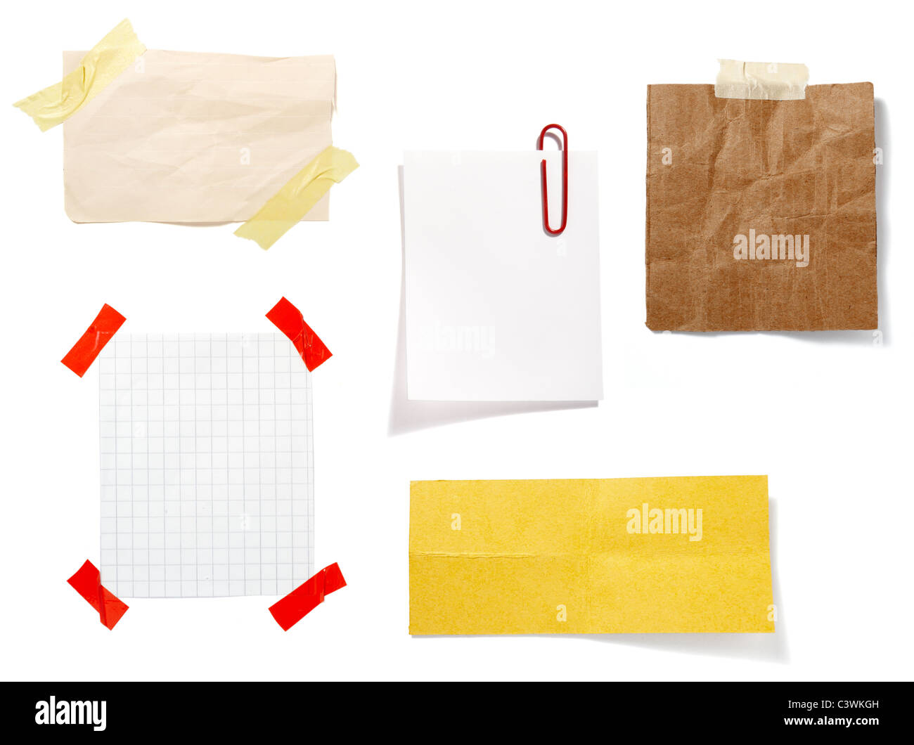 collection of various note papers on white background. each one is shot ...