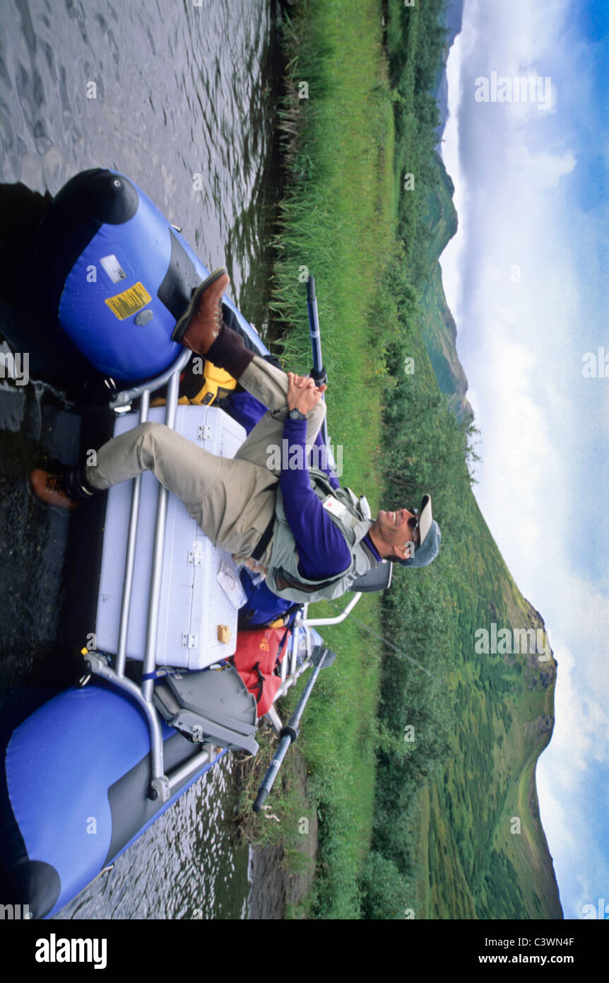 Man fly fishing Stock Photo - Alamy