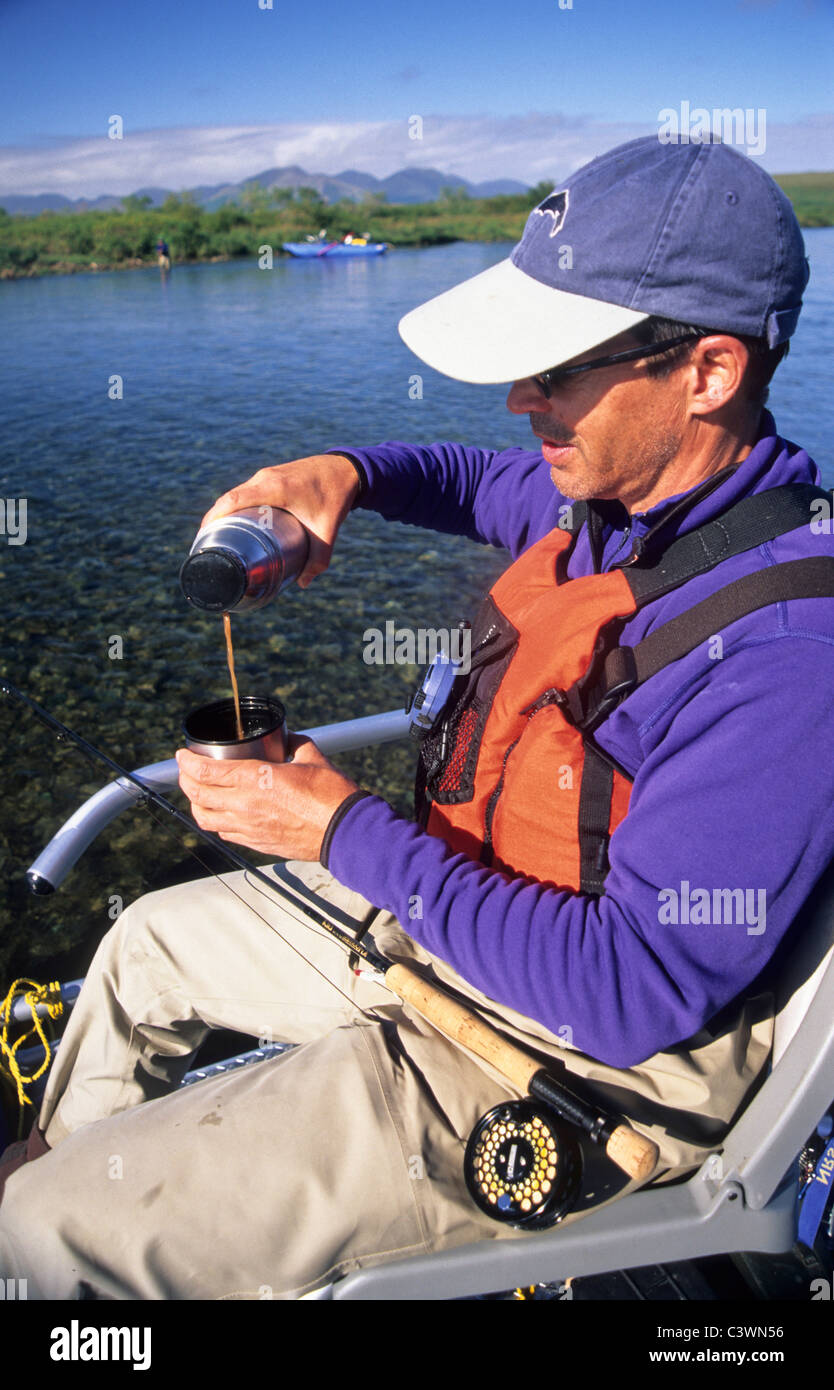 Man fly fishing Stock Photo - Alamy