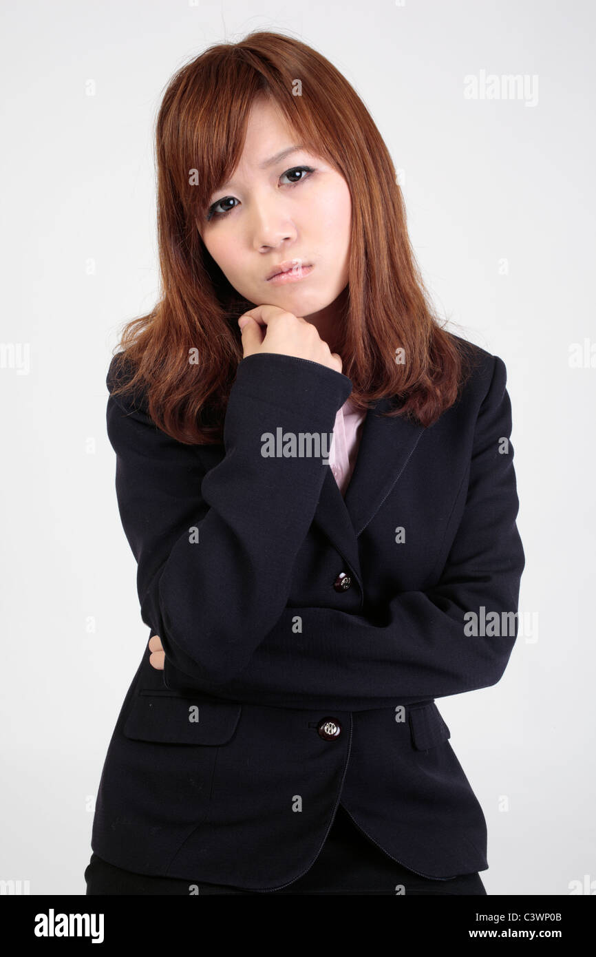 Office lady thinks Stock Photo - Alamy