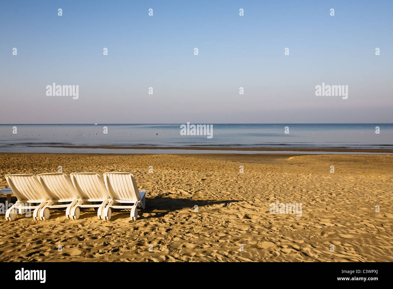 Sand chair shadow beach hi-res stock photography and images - Alamy