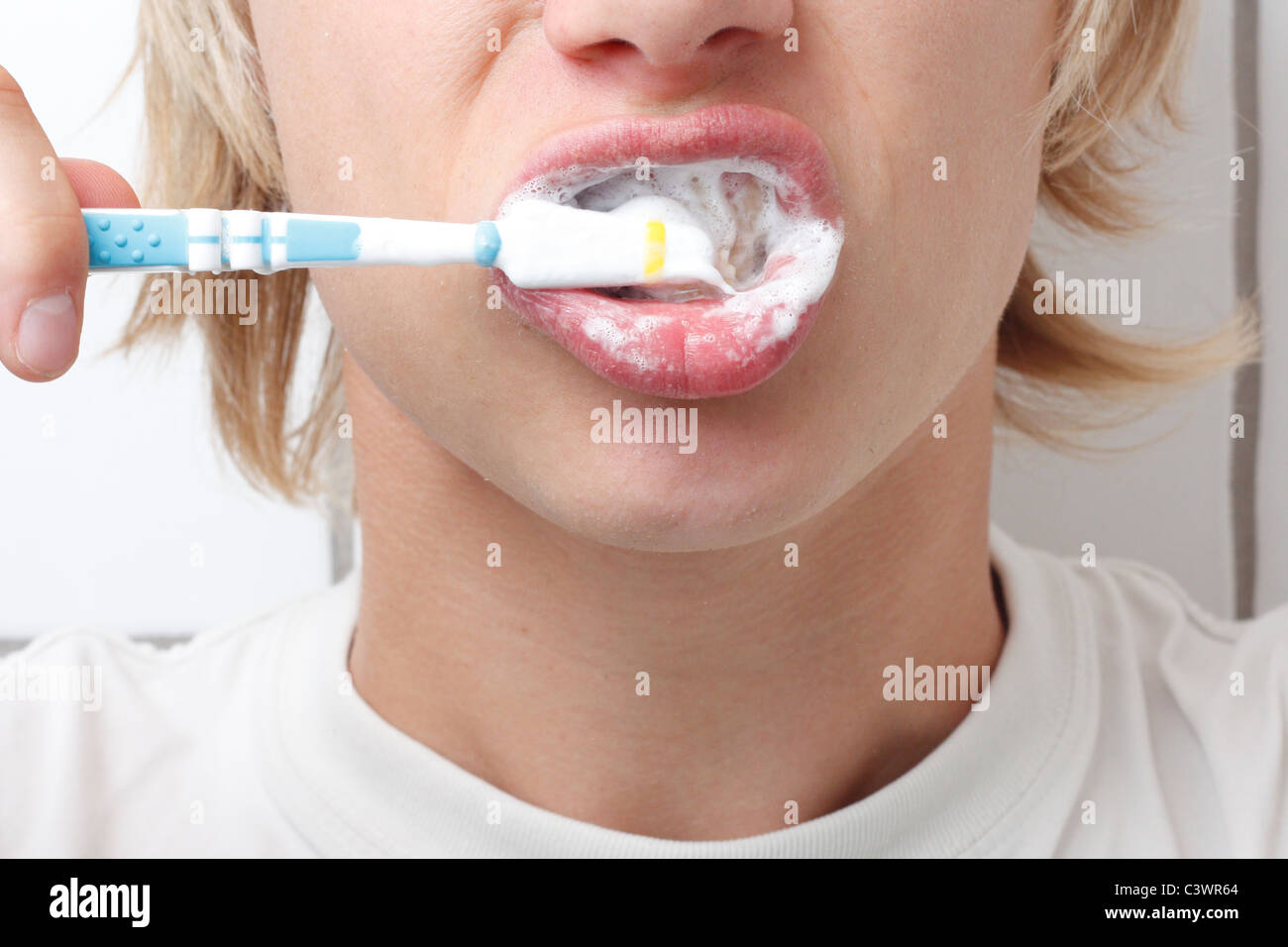 A person brushing his teeth Stock Photo - Alamy