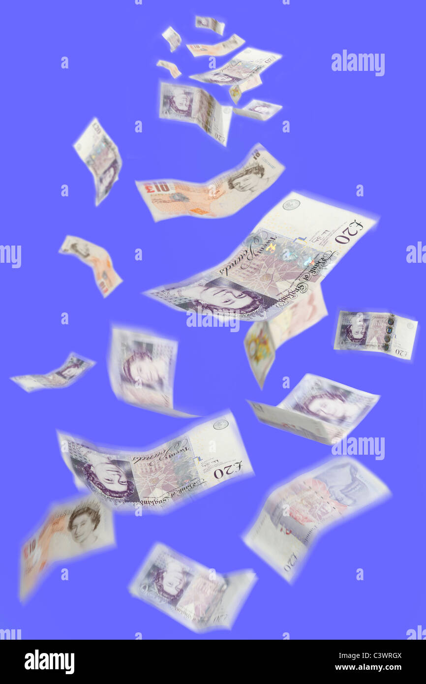 Money floating from above Stock Photo - Alamy
