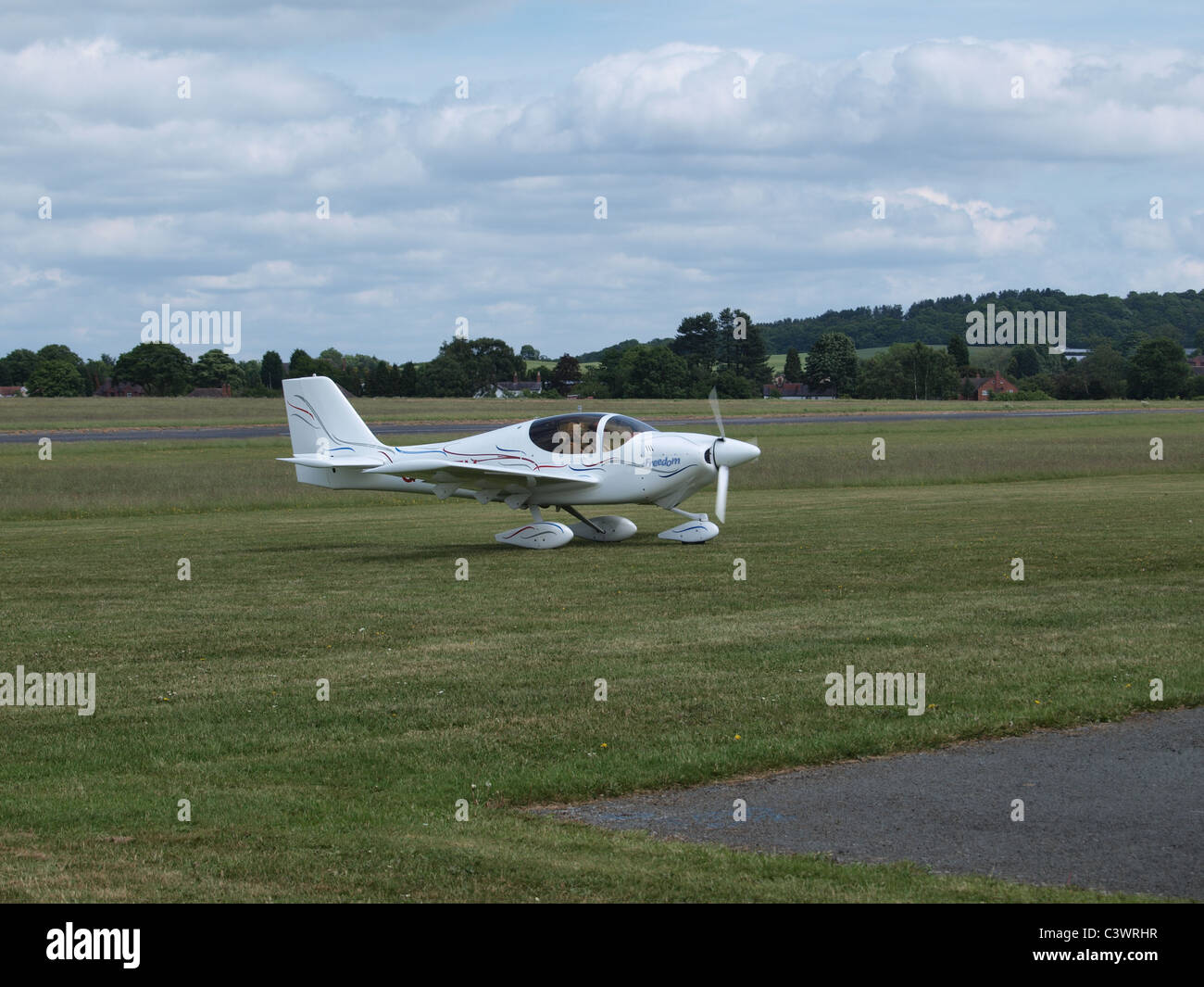 Light aircraft taxiing on grass at Wolverhampton Airport Stock Photo ...