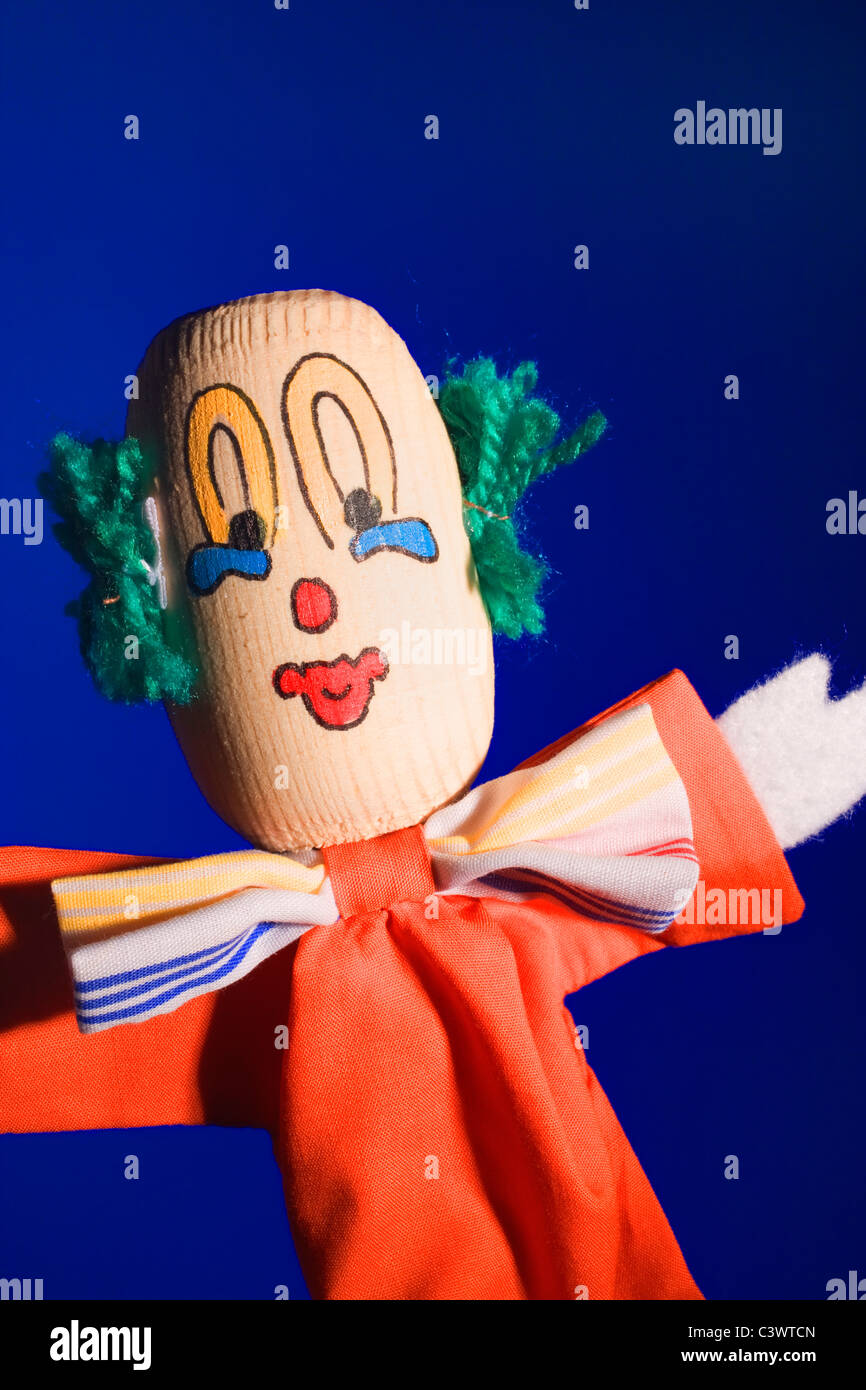 A traditional handmade wooden toy clown Stock Photo - Alamy