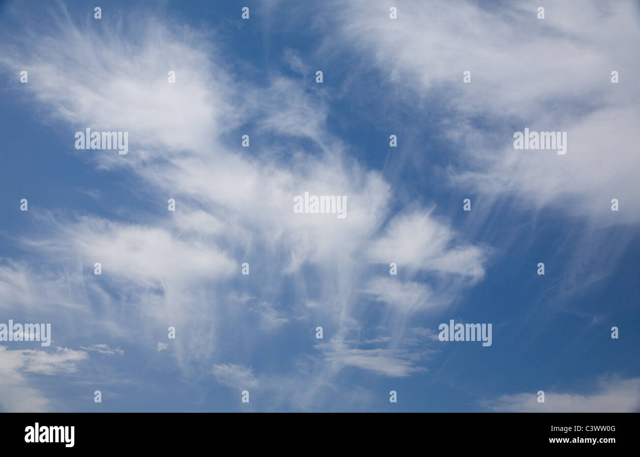 Blue sky with 'jellyfish' clouds Stock Photo - Alamy