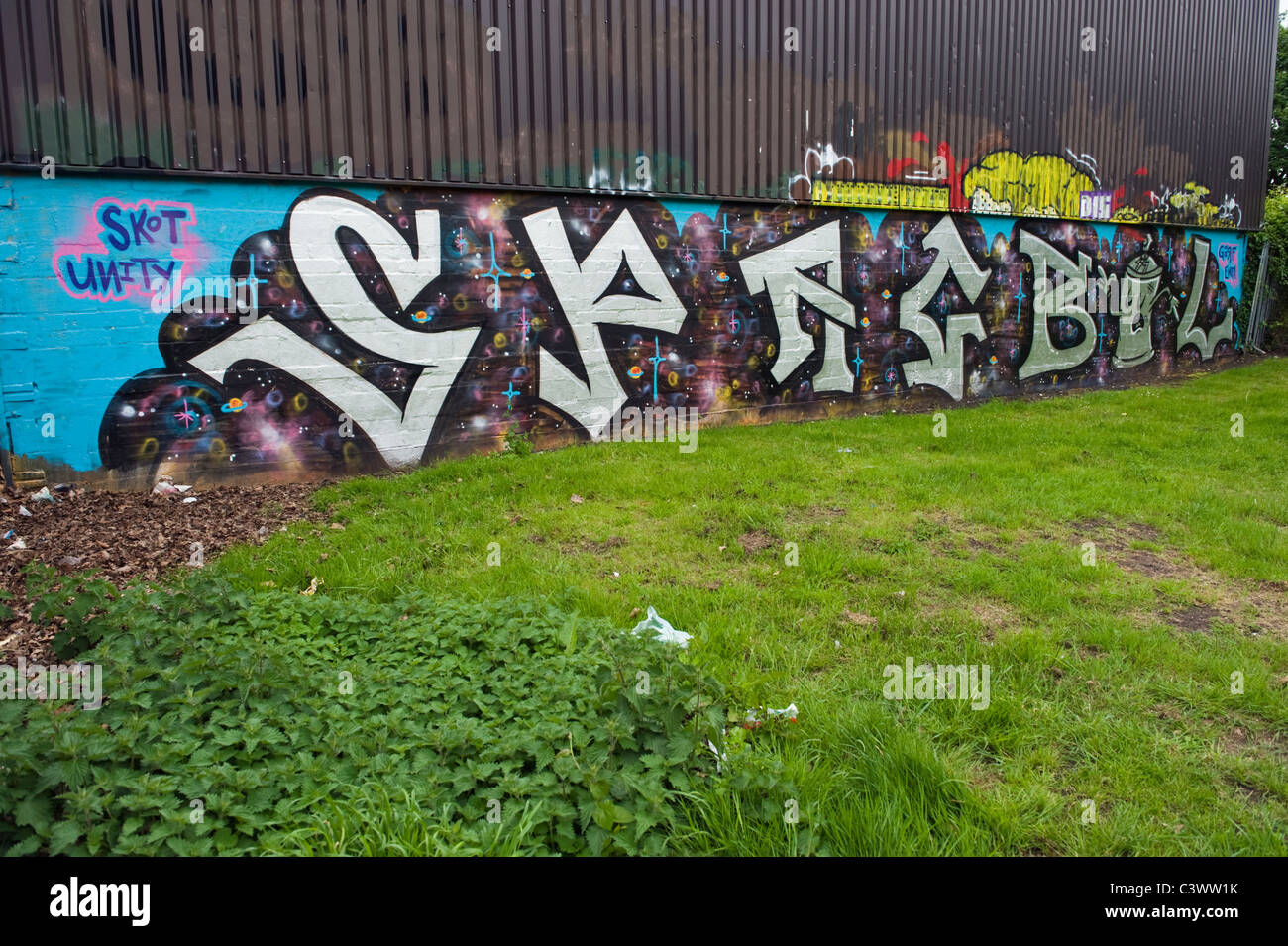 SPAGBOL urban graffiti artwork on wall of unit factory in Cardiff South ...