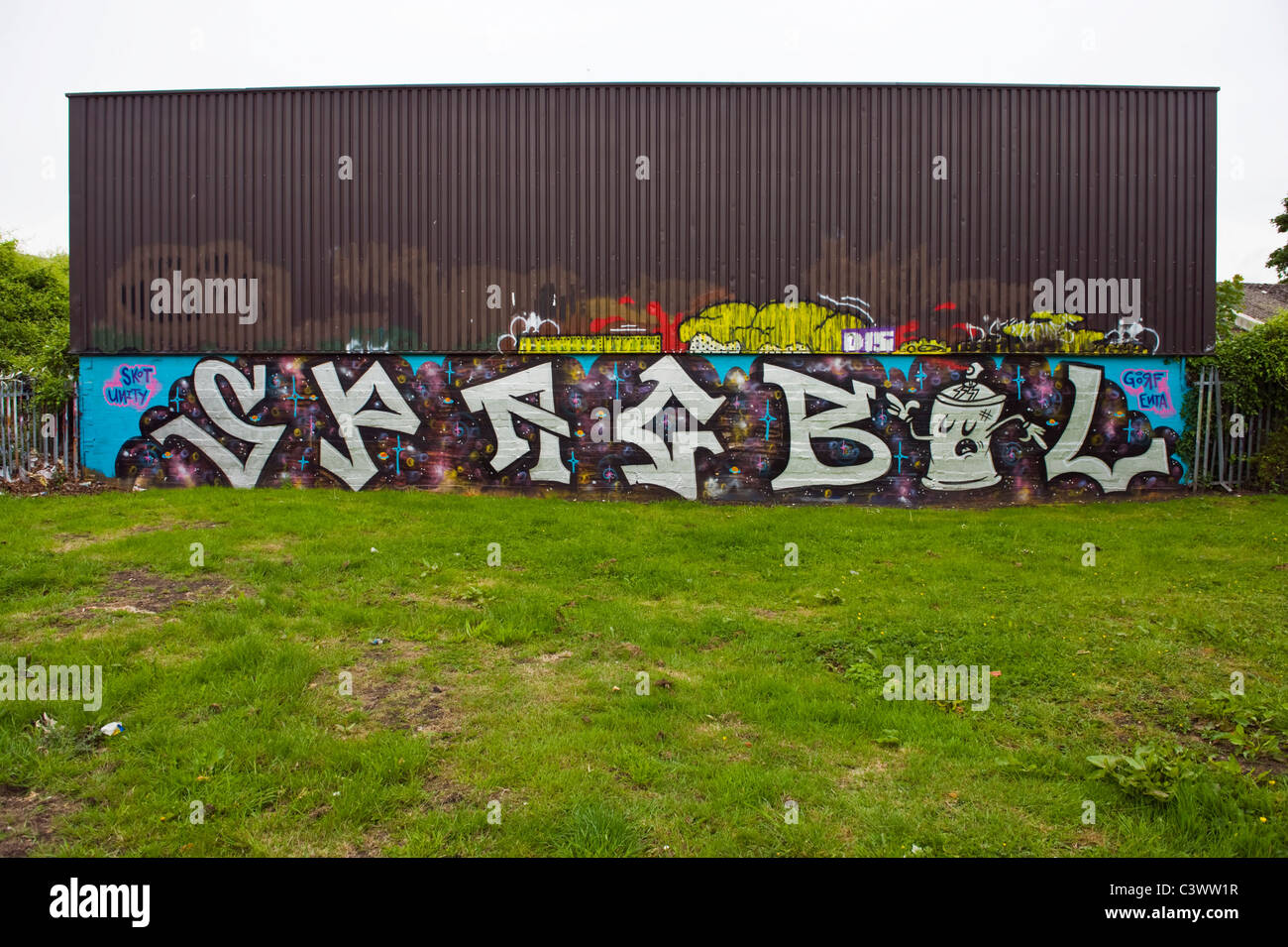 SPAGBOL urban graffiti artwork on wall of unit factory in Cardiff South ...