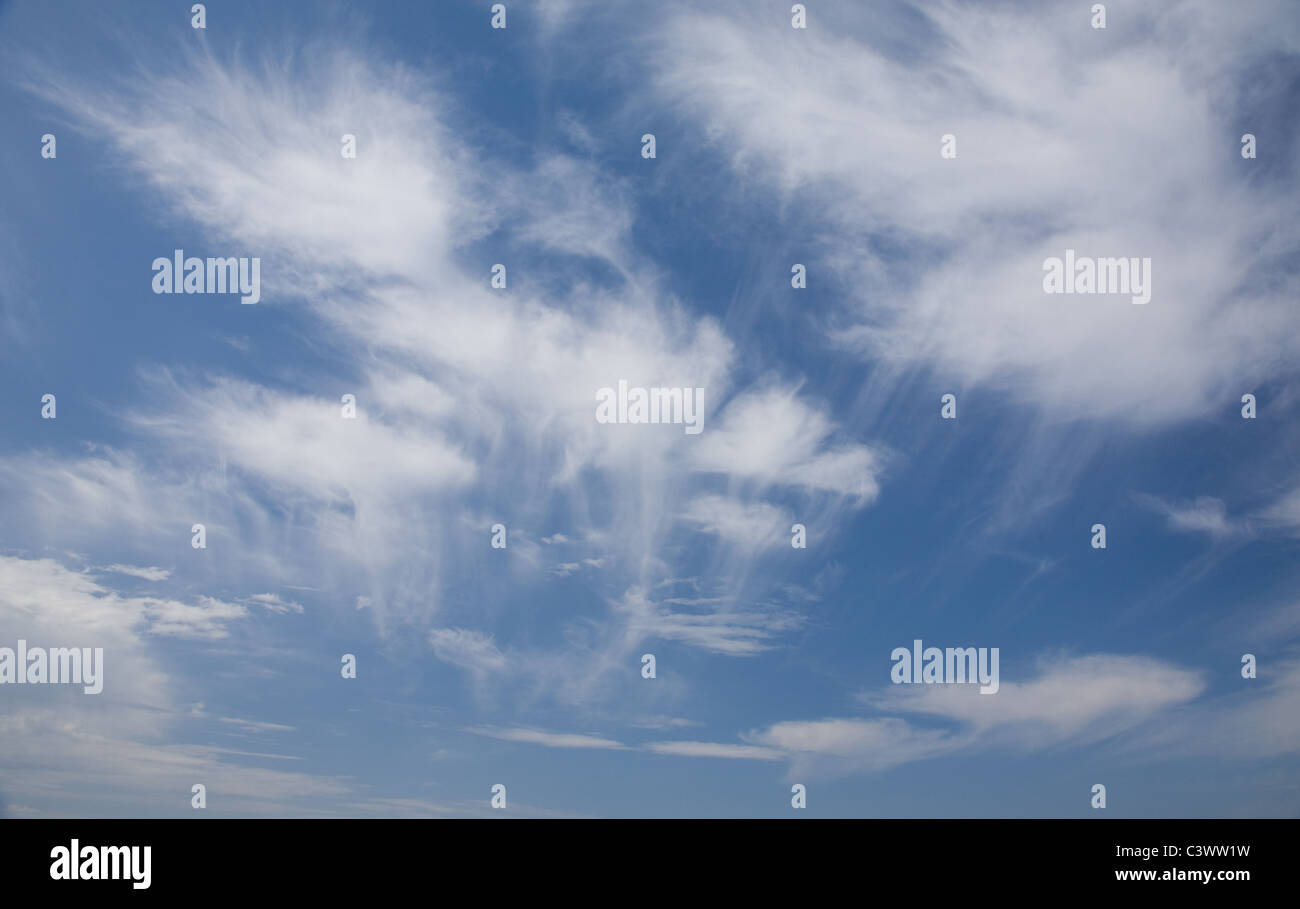 Blue sky with 'jellyfish' clouds Stock Photo - Alamy