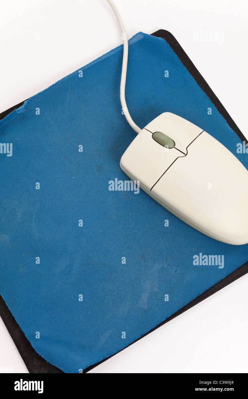 Computer Mouse and old Mouse pad close up Stock Photo - Alamy