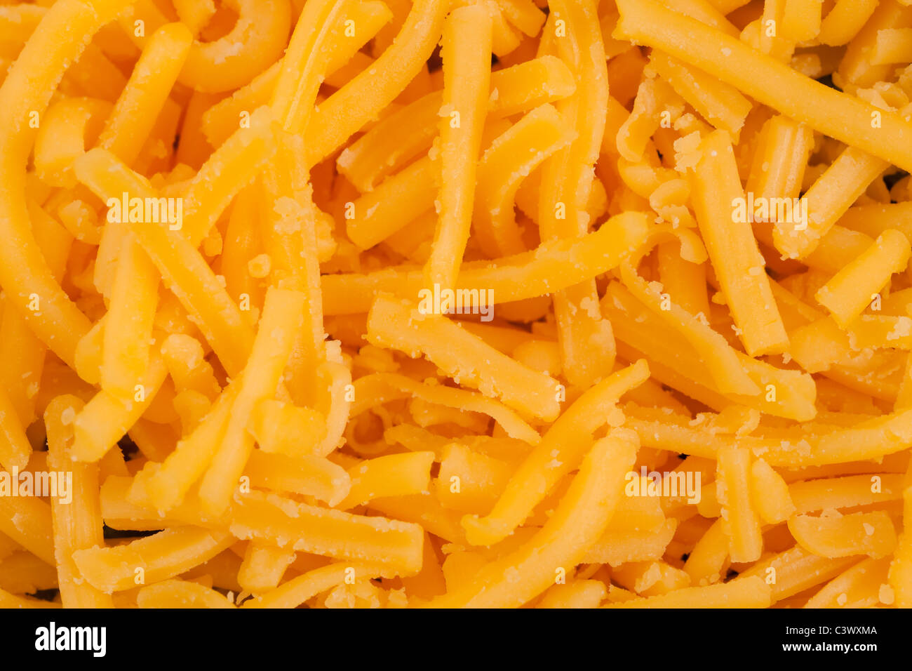 Grated yellow cheese hi-res stock photography and images - Alamy