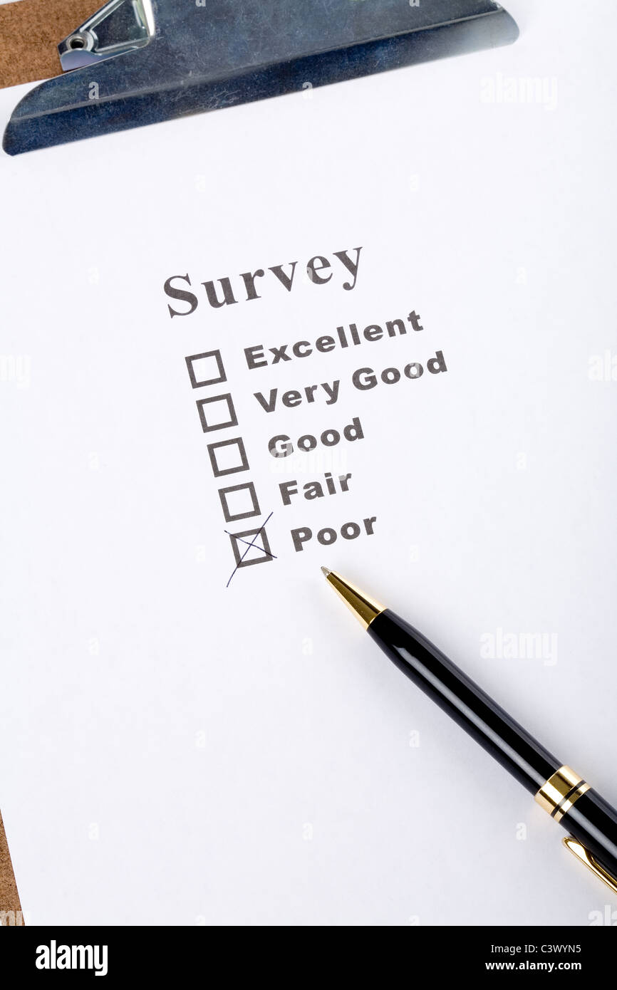 questionnaire and pen, business concept Stock Photo - Alamy