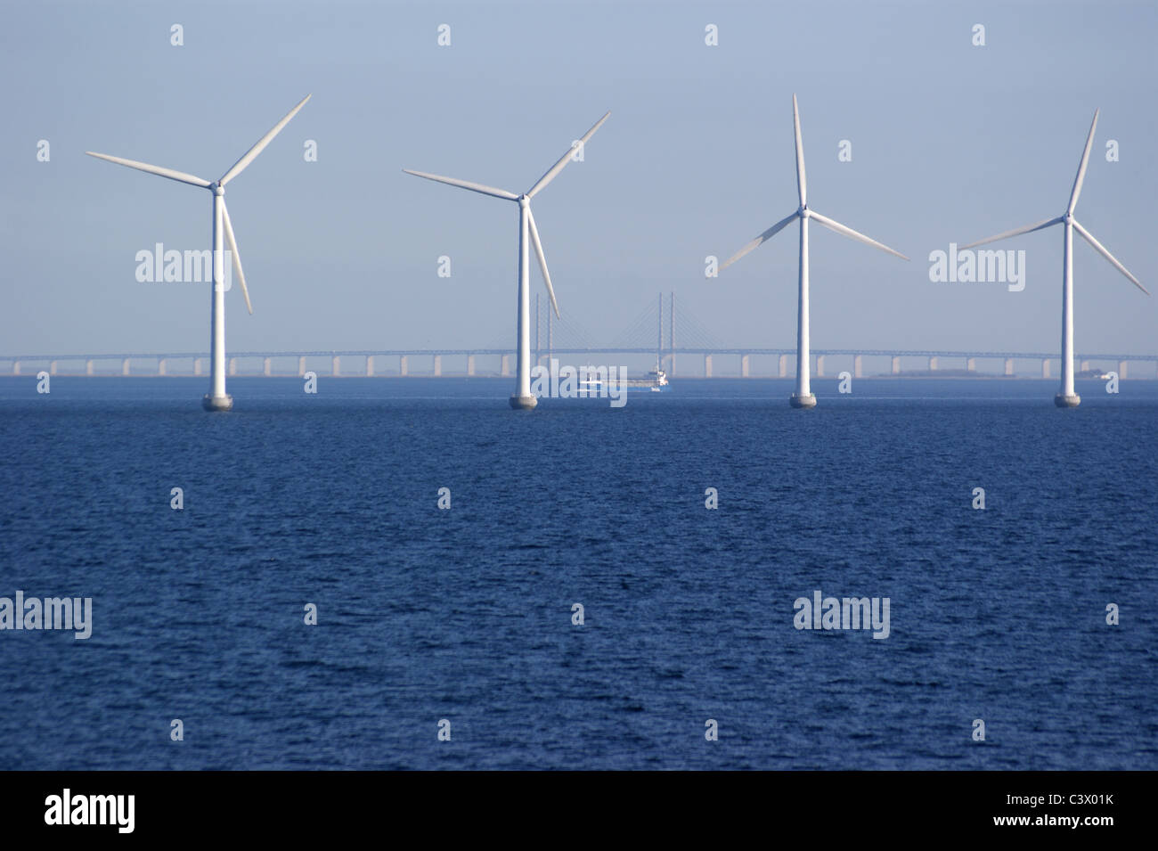 Offshore wind farm, Copenhagen, Denmark with Oresund bridge behind ...