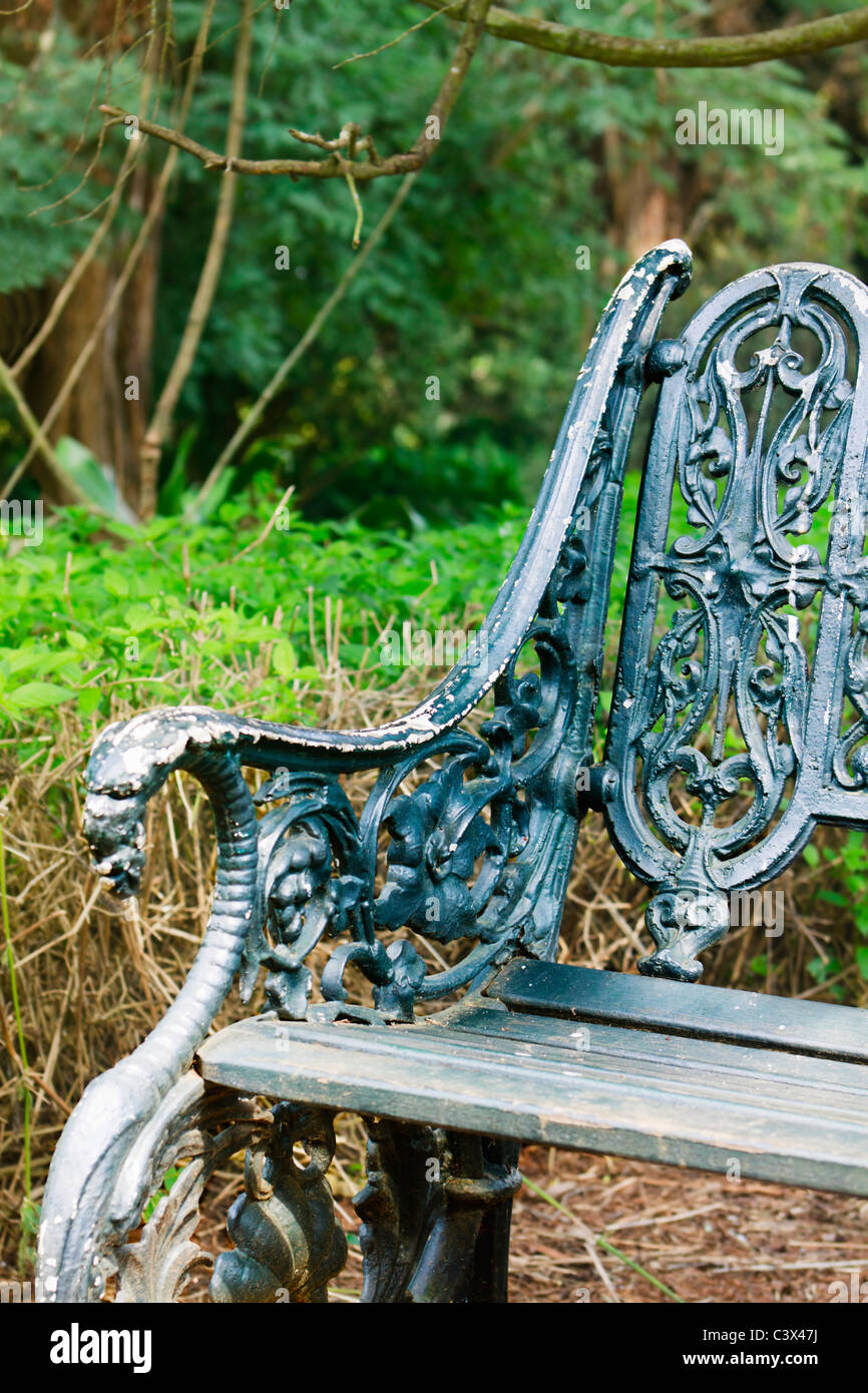 Cast iron neo-Gothic styled park bench Stock Photo - Alamy