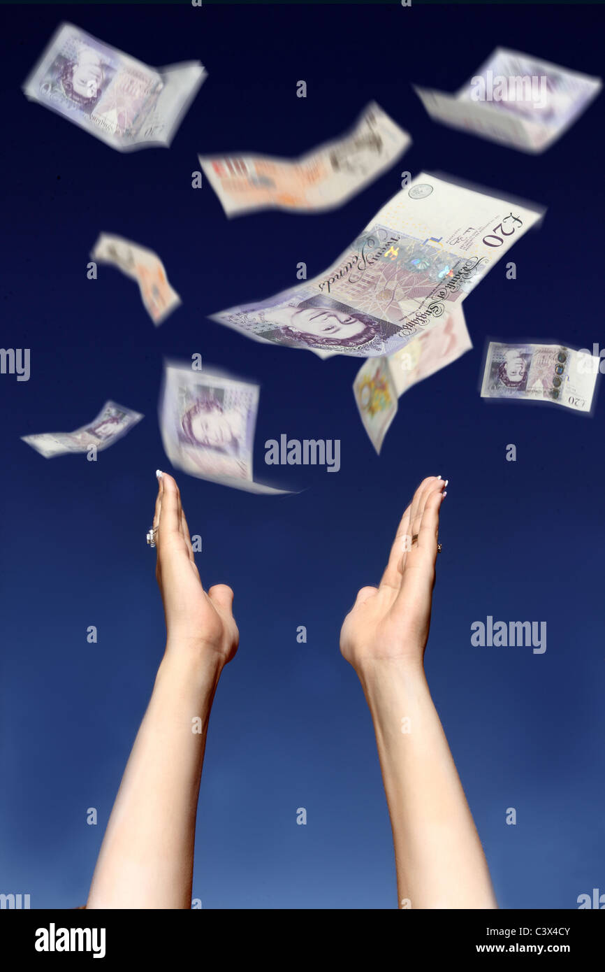 Money falling hi-res stock photography and images - Alamy