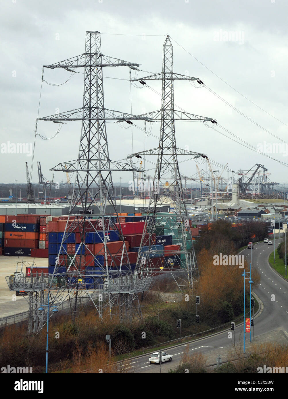 A corner of a busy city's industrial area showing docks, electricity ...