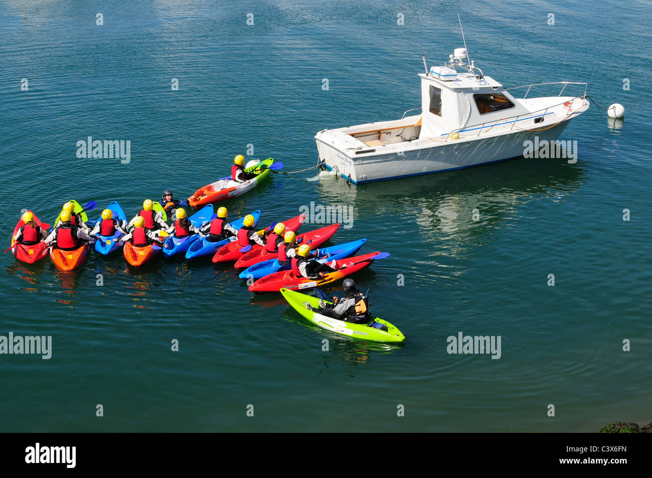kayak lesson for children in Brixham Harbour Devon England UK GB Stock ...