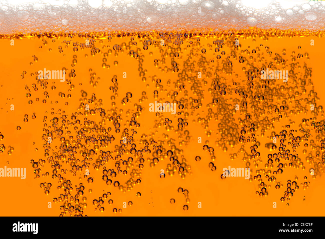 Bubbling beer in a glass Stock Photo - Alamy