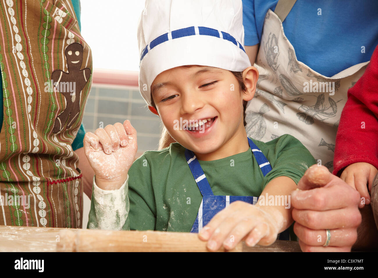 Young boy having fun in kitchen Stock Photo - Alamy