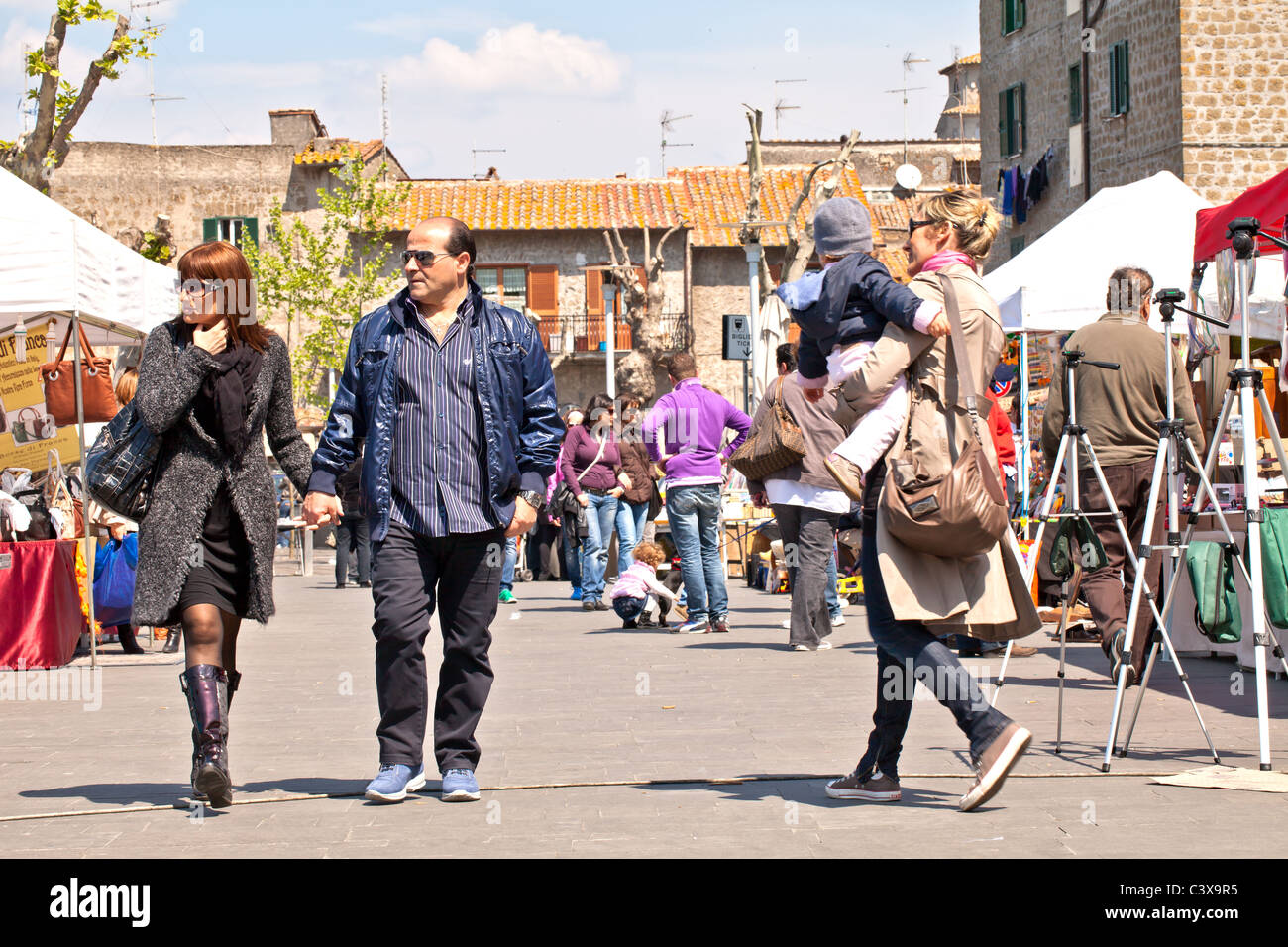 People visiting small market Stock Photo - Alamy