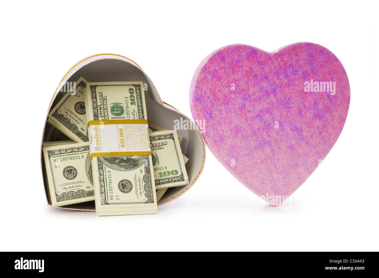 Heart shaped gift box and dollars inside Stock Photo - Alamy