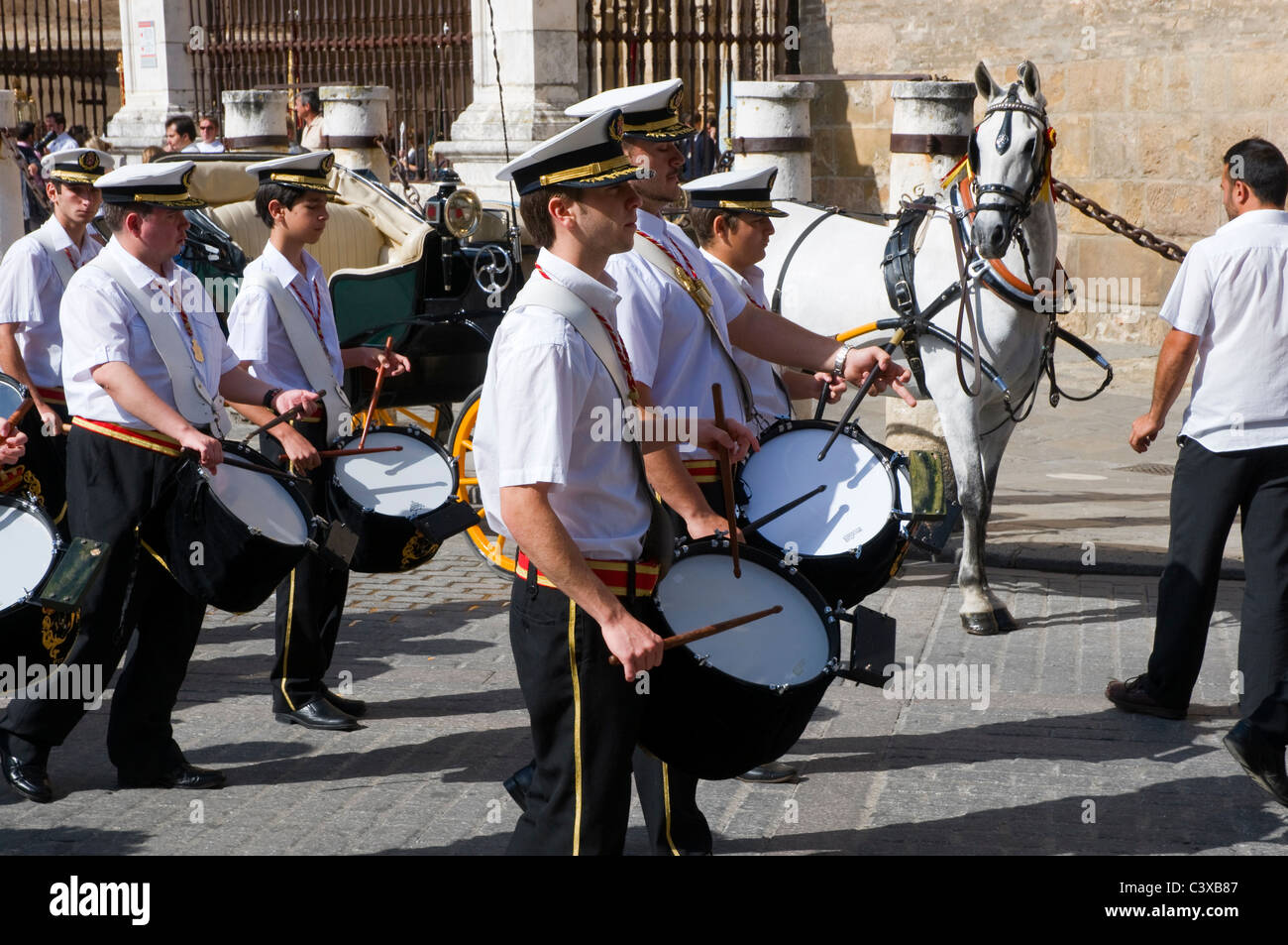 Musicians taking part in a religious procession, Seville, Andalusia ...