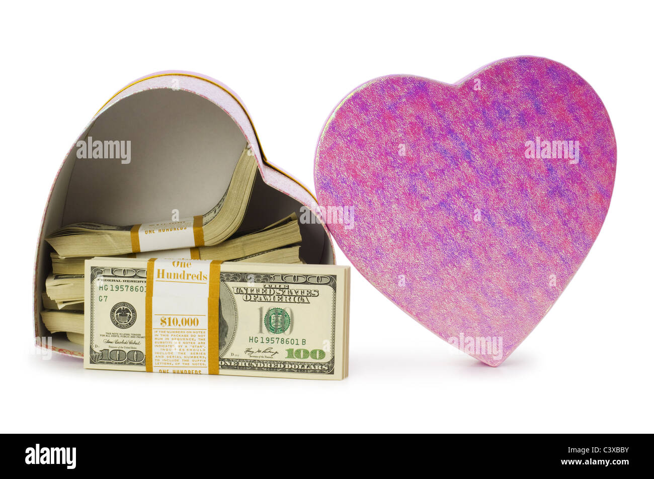 Heart shaped gift box and dollars inside Stock Photo - Alamy