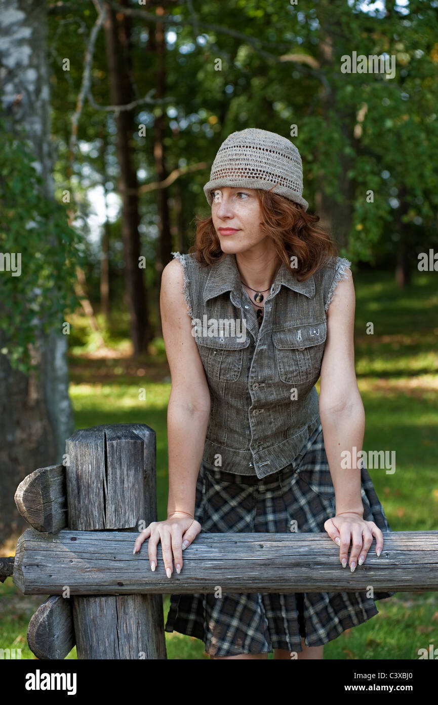 Woman with cap in nature Stock Photo - Alamy