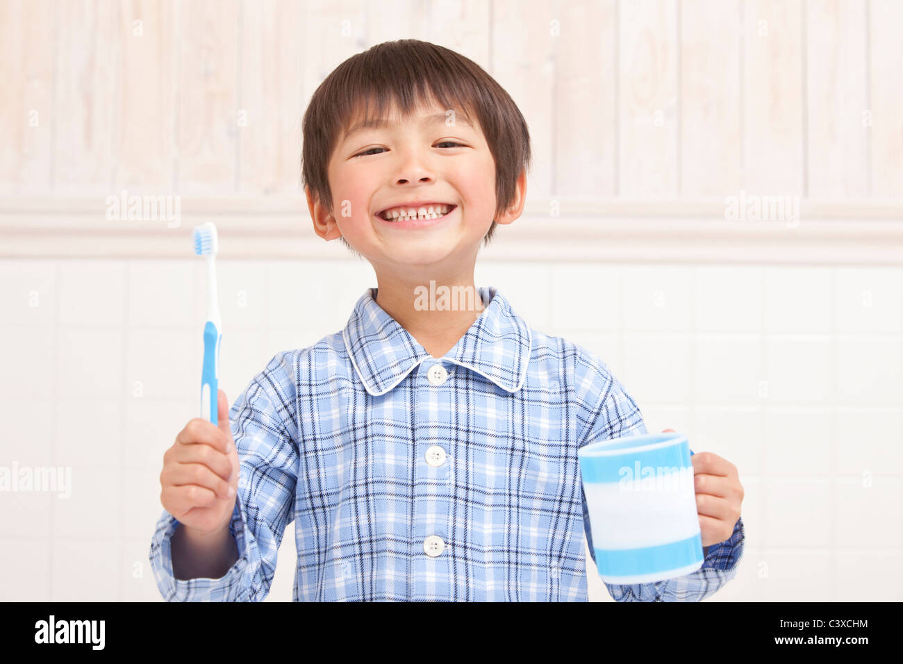 Boy with Toothbrush Stock Photo - Alamy