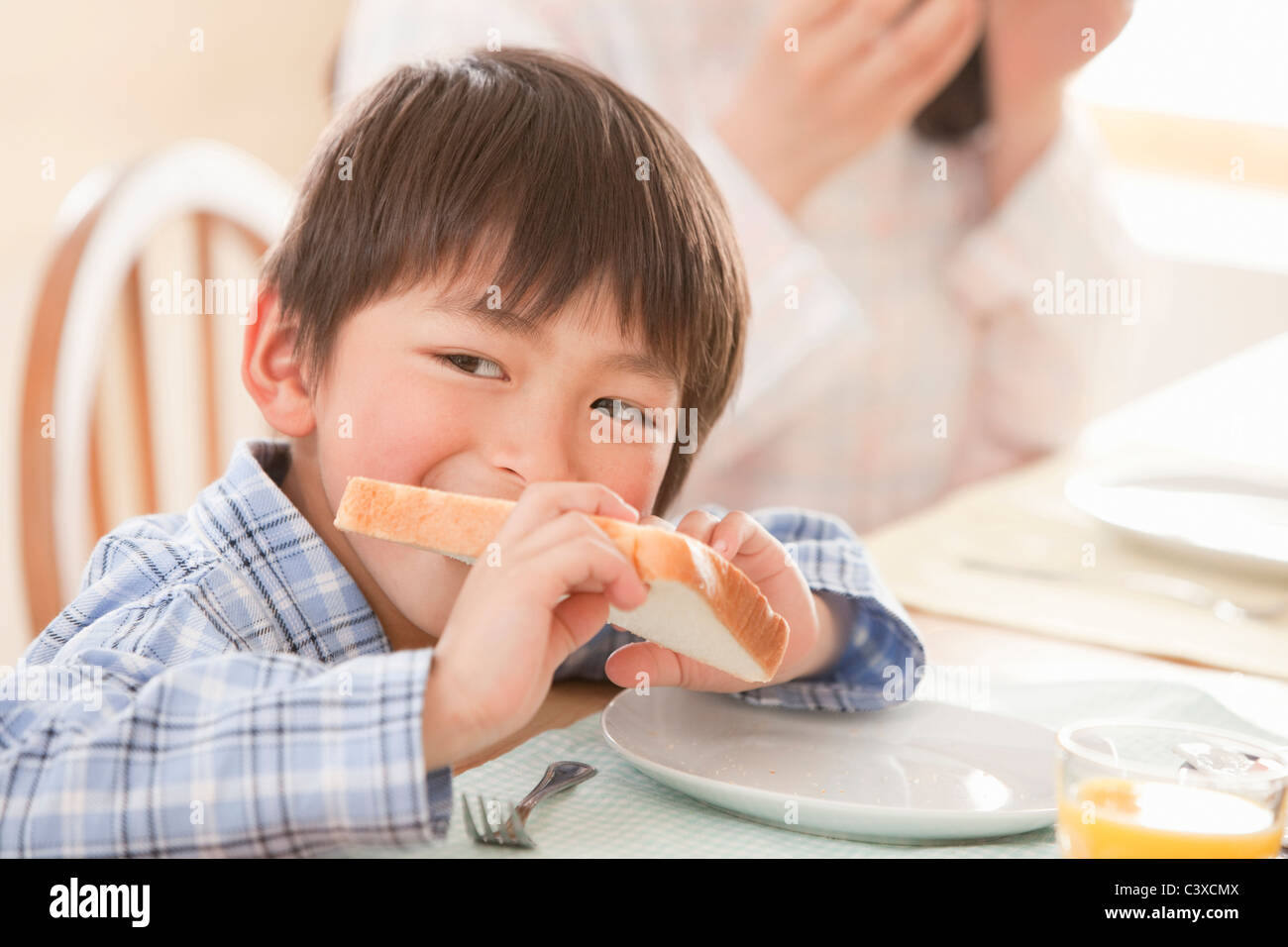 Human eating bread hi-res stock photography and images - Alamy