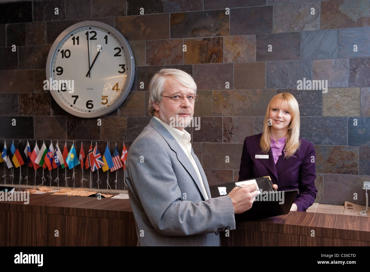 Male traveler posing suitcase hi-res stock photography and images - Alamy
