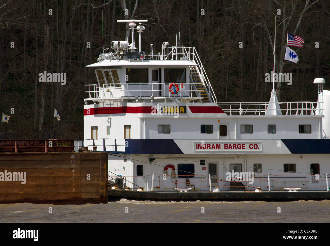 Tugboat M/V Omar pushing a load of barges down the Ohio River between ...