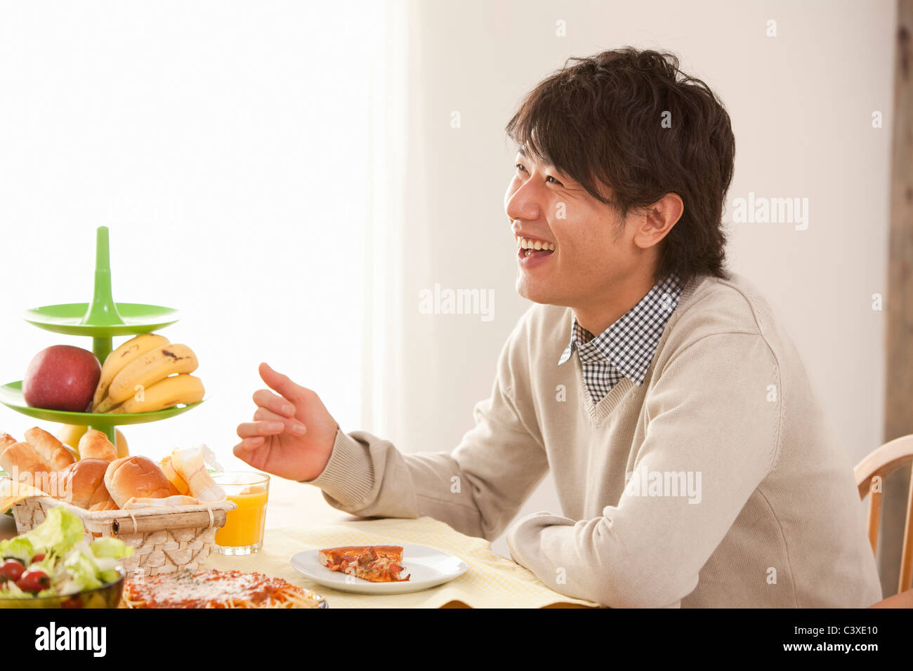 Young Man Having Lunch Stock Photo - Alamy