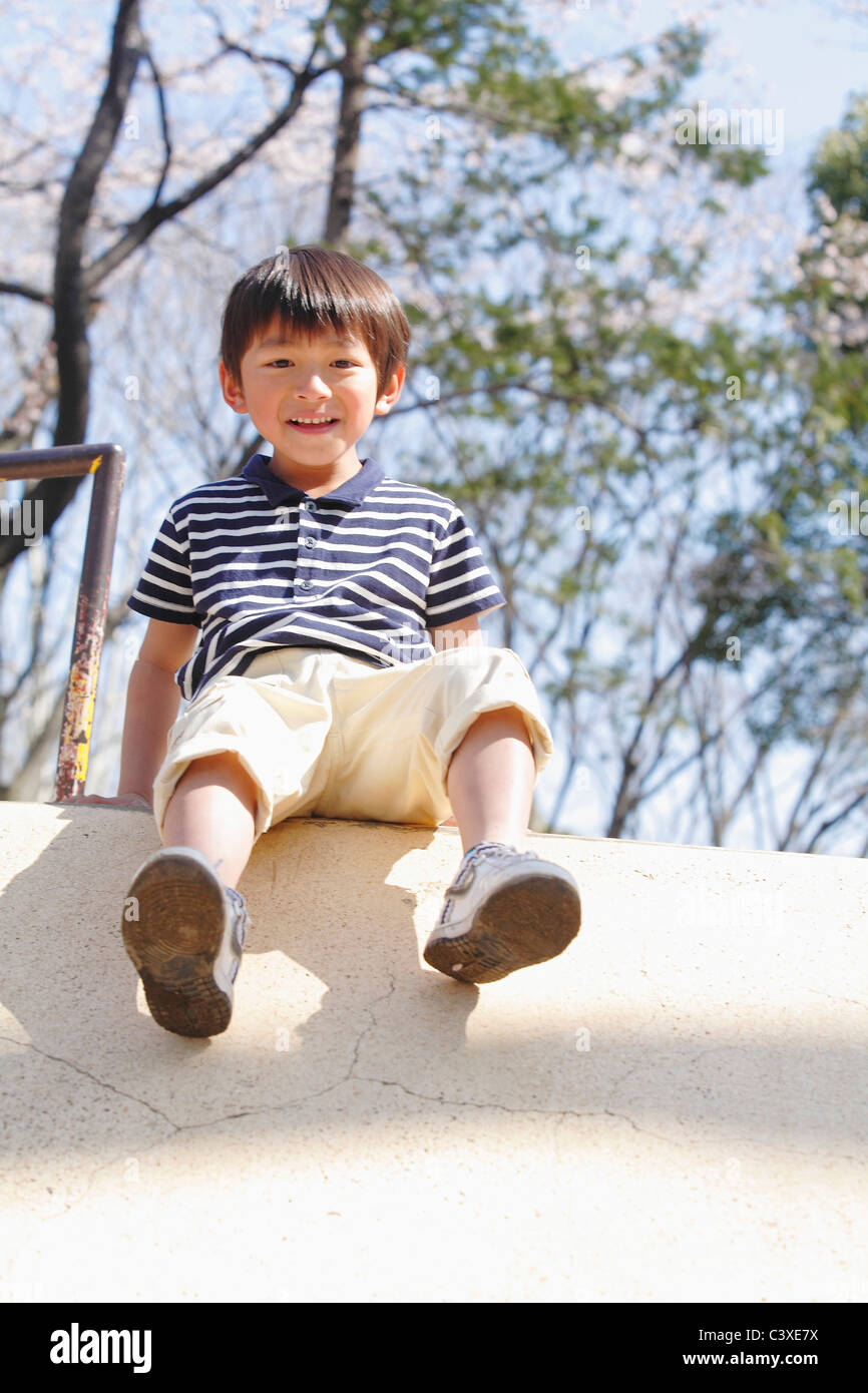 Boy at Playground Stock Photo - Alamy
