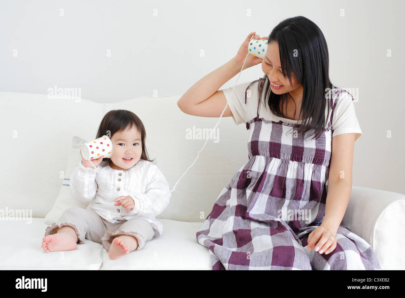 Tin can string telephone hi-res stock photography and images - Alamy