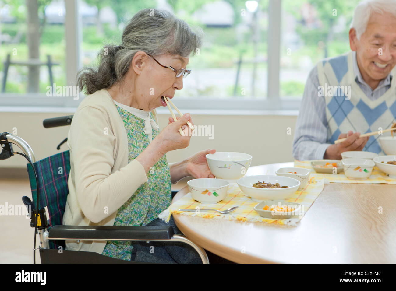 Senior People Eating in Nursing Home Stock Photo - Alamy