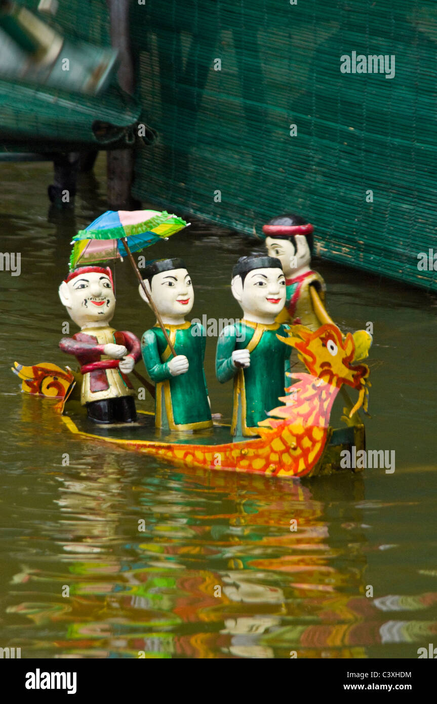 Vertical close up of the highly decorative water puppets in a ...