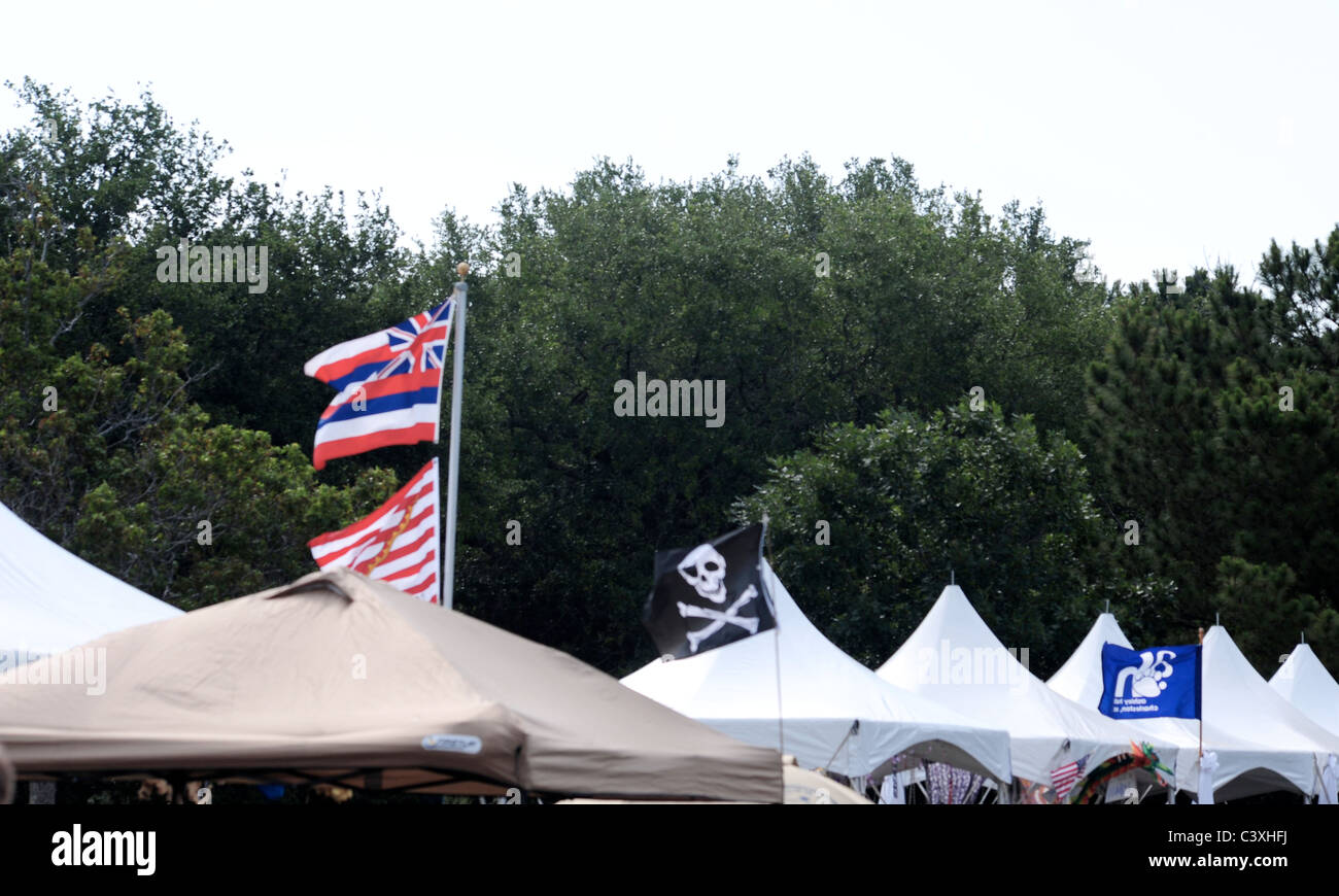flags atop tents at Dragon Boat Race Stock Photo - Alamy