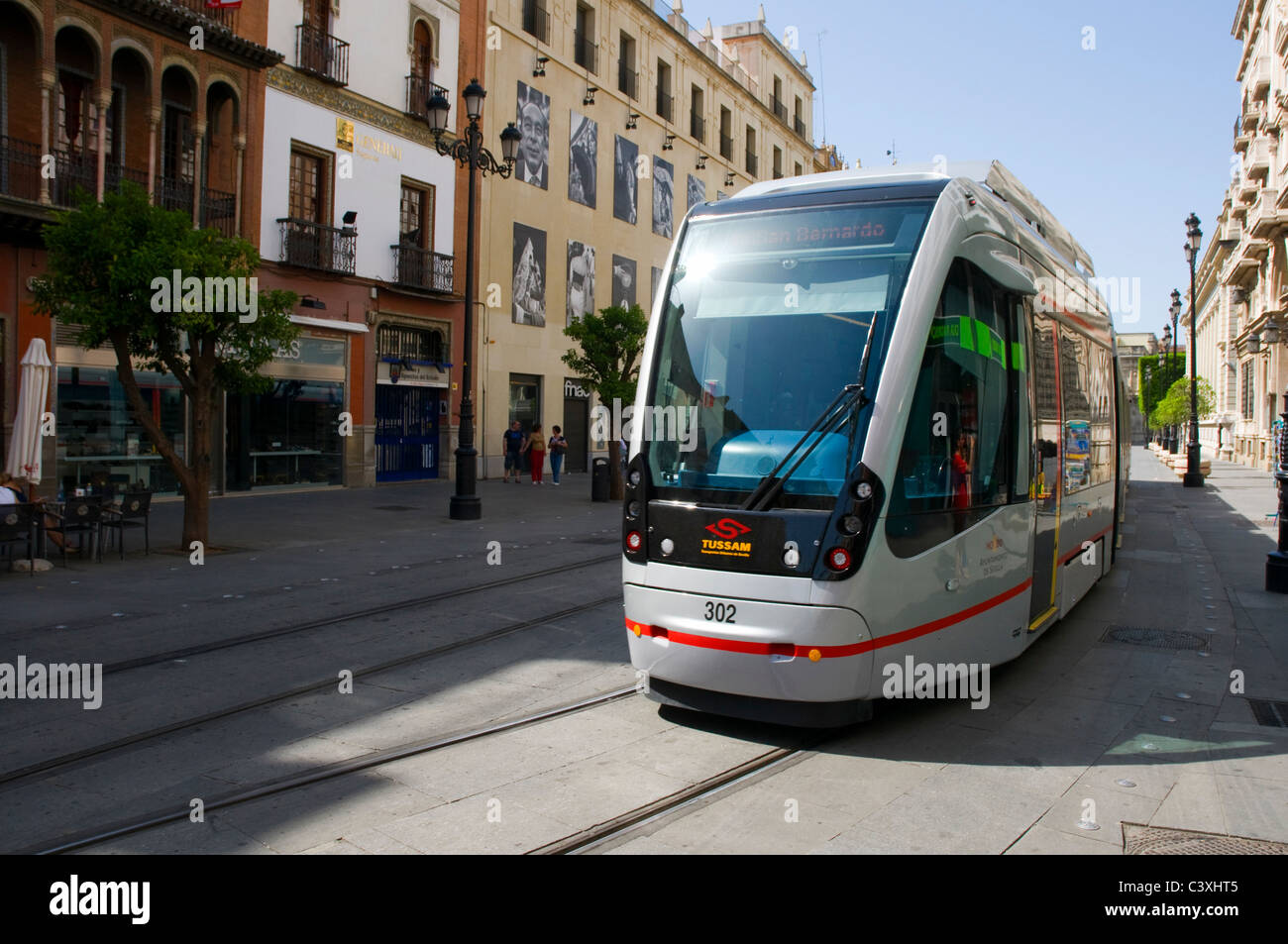 A modern tram in the ancient city of Seville, Spain Stock Photo - Alamy