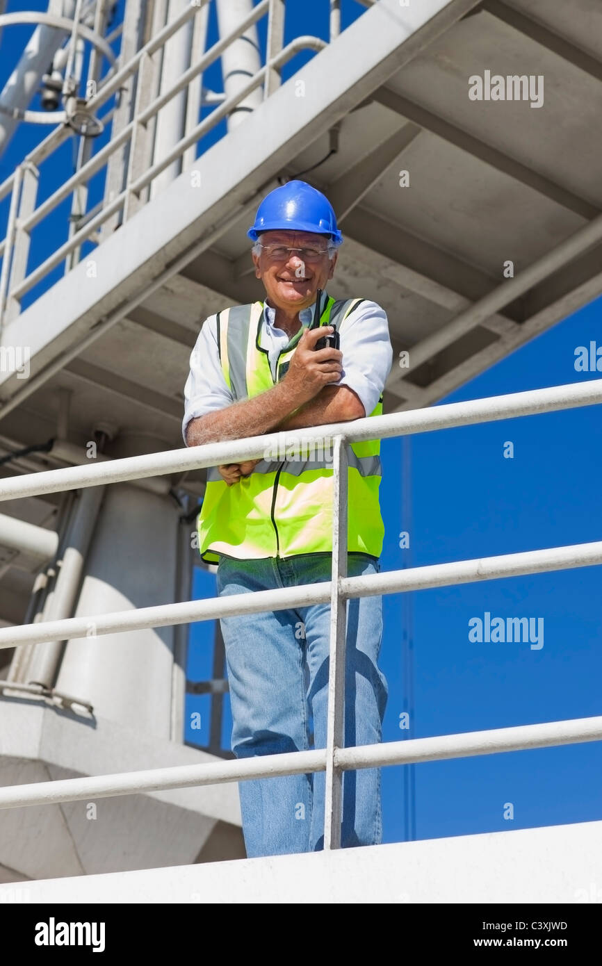 Man leaning on guardrail hi-res stock photography and images - Alamy