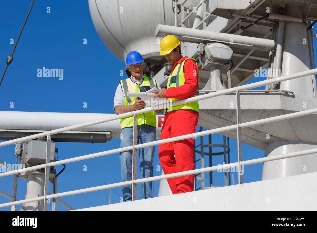 Man leaning on guardrail hi-res stock photography and images - Alamy