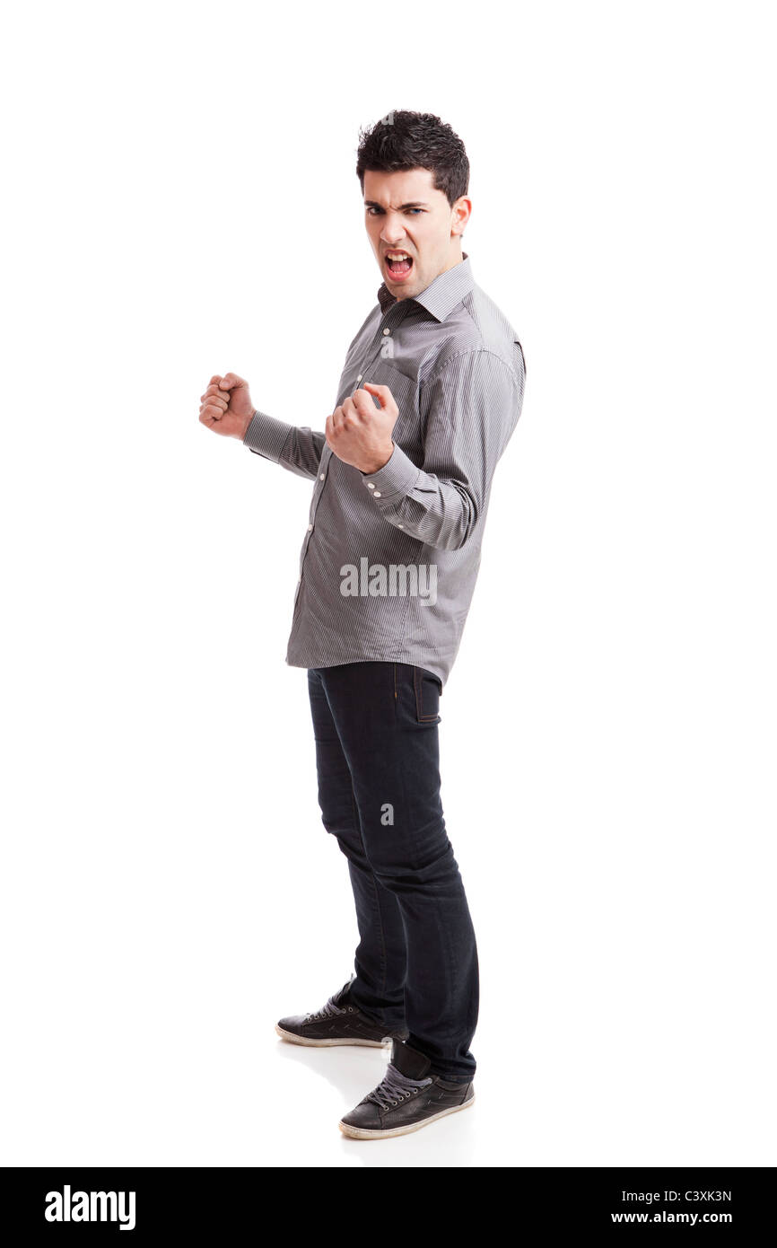 Happy young man with arms up isolated on a white background Stock Photo ...