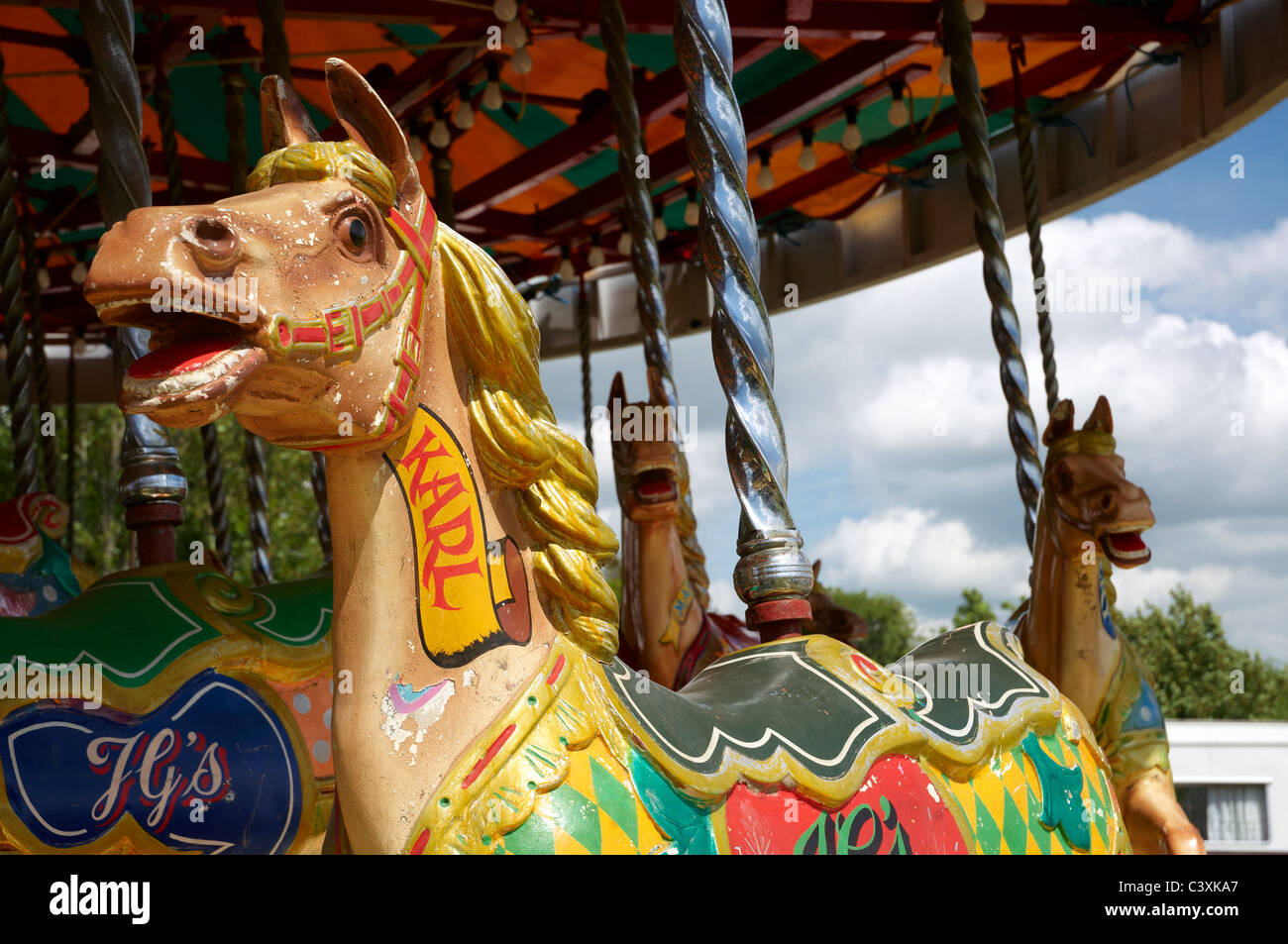 Wooden horses know as 'gallopers' on a traditional fair ground ride at ...